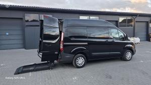 Black Ford Transit Custom 2016 in Klaipeda, with an engine capacity of 2.20 L and mileage of 237 thousand km for 7990 €, photo 10 on AUTOMOTO.COM.LV