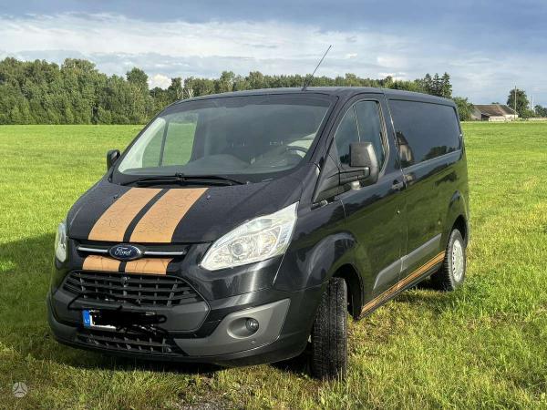 Black Ford Transit Custom 2014 in Panevezys, with an engine capacity of 2.20 L and mileage of 303 thousand km for 4800 €, photo 1 on AUTOMOTO.COM.LV
