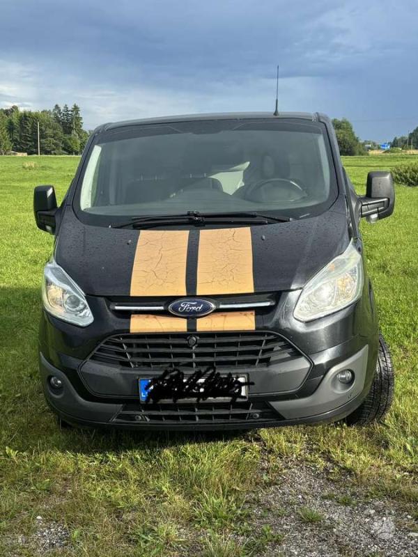 Black Ford Transit Custom 2014 in Panevezys, with an engine capacity of 2.20 L and mileage of 303 thousand km for 4800 €, photo 2 on AUTOMOTO.COM.LV