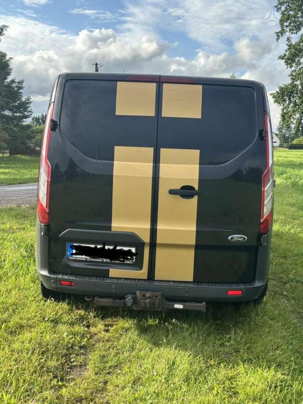 Black Ford Transit Custom 2014 in Panevezys, with an engine capacity of 2.20 L and mileage of 303 thousand km for 4800 €, photo 3 on AUTOMOTO.COM.LV