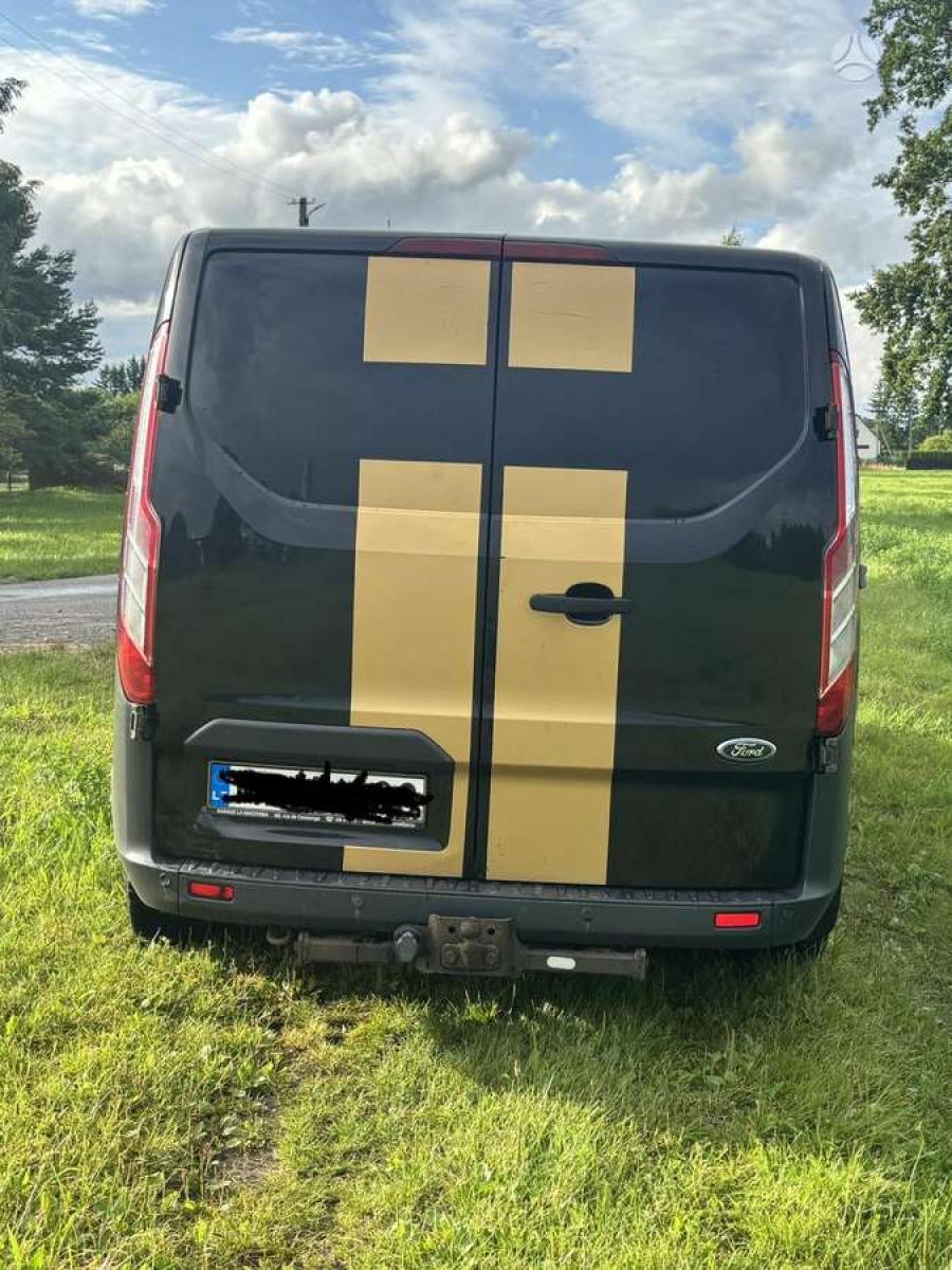 Black Ford Transit Custom 2014 in Panevezys, with an engine capacity of 2.20 L and mileage of 303 thousand km for 4800 €, photo 4 on AUTOMOTO.COM.LV