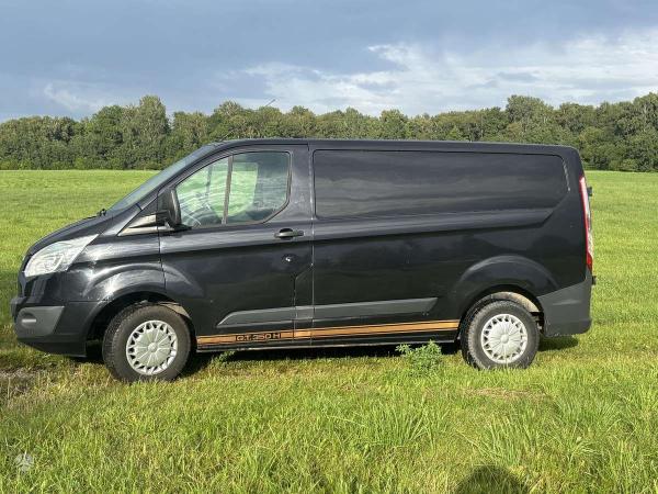 Black Ford Transit Custom 2014 in Panevezys, with an engine capacity of 2.20 L and mileage of 303 thousand km for 4800 €, photo 4 on AUTOMOTO.COM.LV