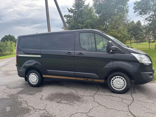 Black Ford Transit Custom 2014 in Panevezys, with an engine capacity of 2.20 L and mileage of 303 thousand km for 4800 €, photo 5 on AUTOMOTO.COM.LV