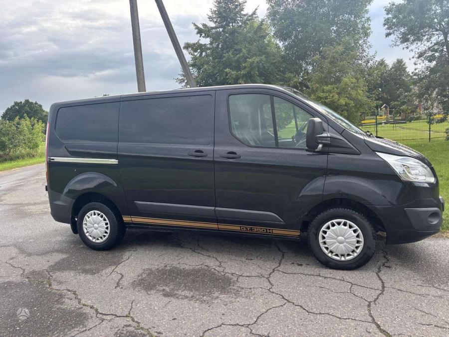 Black Ford Transit Custom 2014 in Panevezys, with an engine capacity of 2.20 L and mileage of 303 thousand km for 4800 €, photo 6 on AUTOMOTO.COM.LV