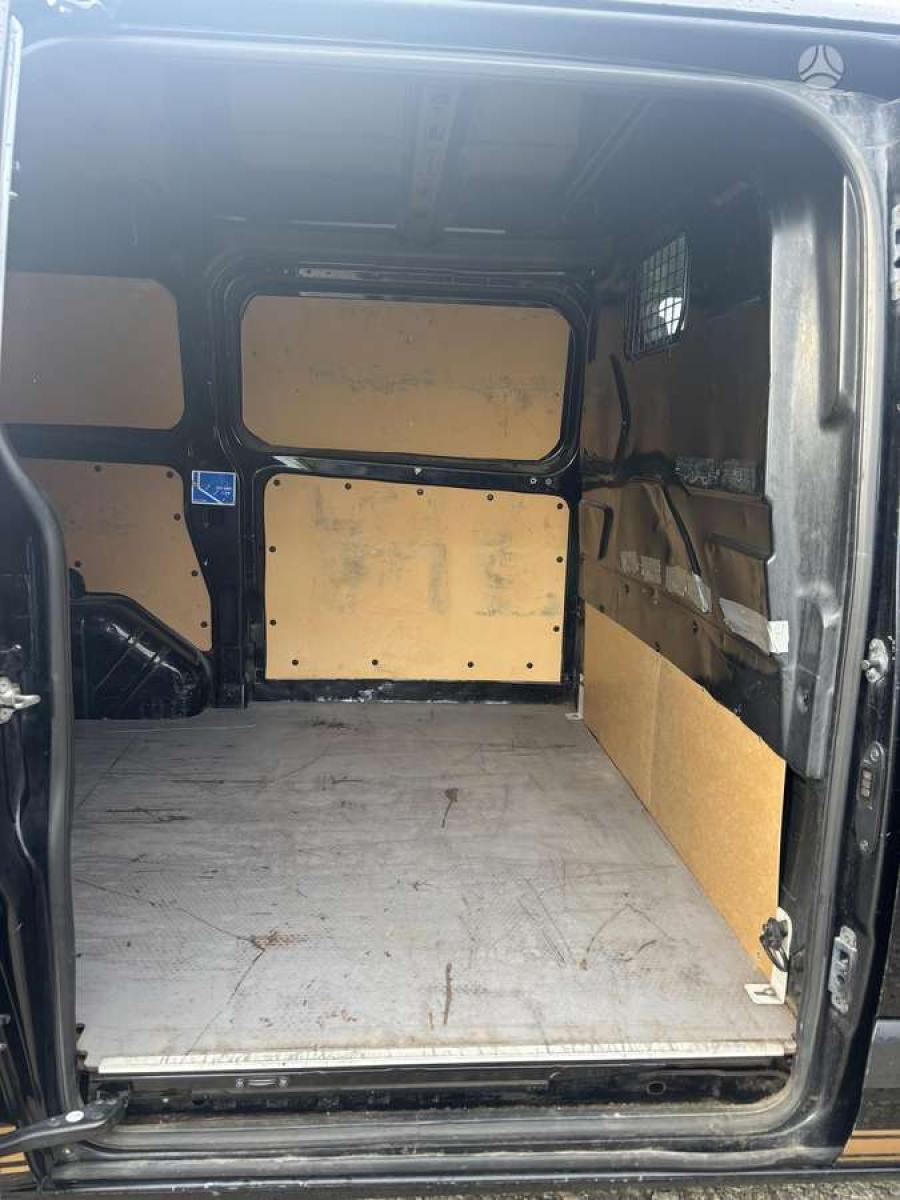 Black Ford Transit Custom 2014 in Panevezys, with an engine capacity of 2.20 L and mileage of 303 thousand km for 4800 €, photo 8 on AUTOMOTO.COM.LV