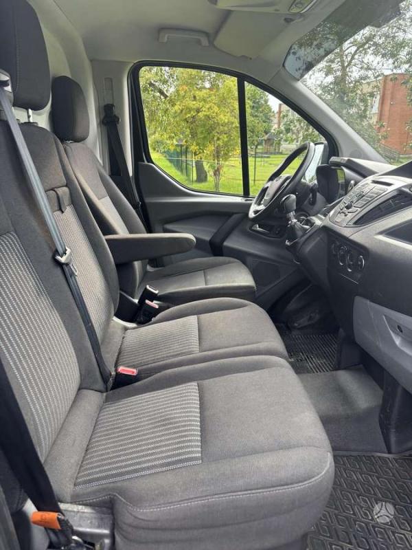 Black Ford Transit Custom 2014 in Panevezys, with an engine capacity of 2.20 L and mileage of 303 thousand km for 4800 €, photo 8 on AUTOMOTO.COM.LV