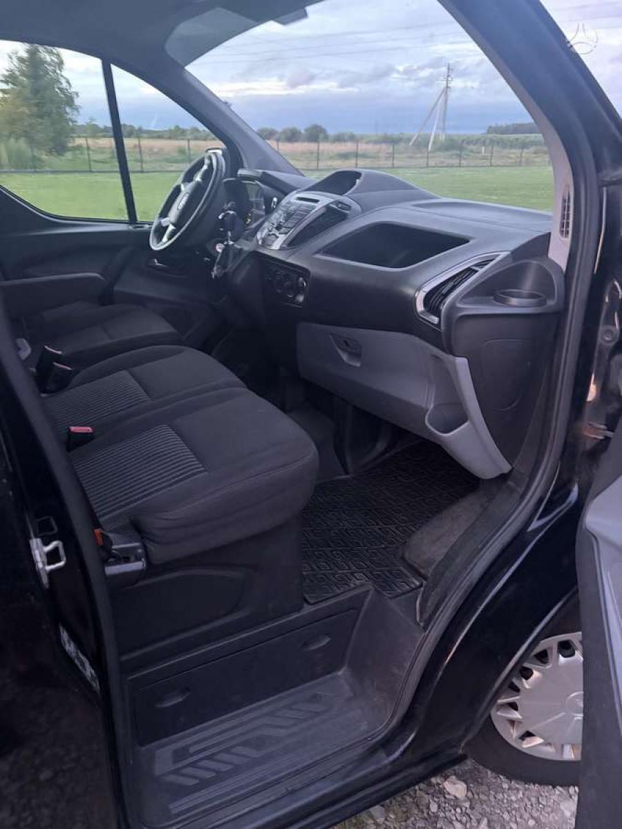 Black Ford Transit Custom 2014 in Panevezys, with an engine capacity of 2.20 L and mileage of 303 thousand km for 4800 €, photo 12 on AUTOMOTO.COM.LV