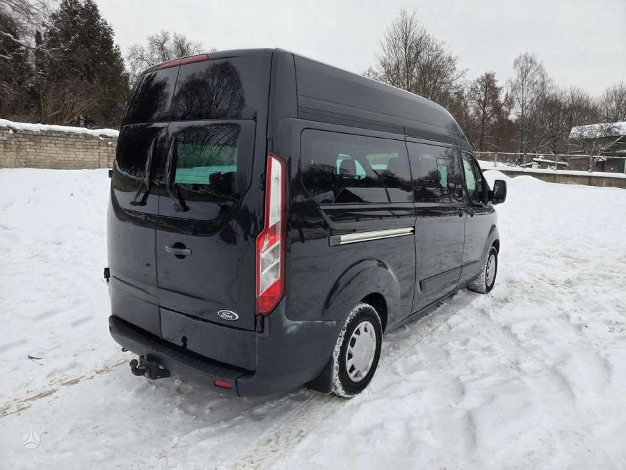 Black Ford Transit Custom 2015 in Vilnius, with an engine capacity of 2.20 L and mileage of 257 thousand km for 11700 €, photo 4 on AUTOMOTO.COM.LV