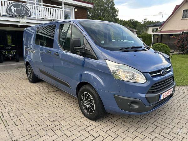 Blue Ford Transit Custom 2012 in Jonava, with an engine capacity of 2.20 L and mileage of 323 thousand km for 4950 €, photo 4 on AUTOMOTO.COM.LV