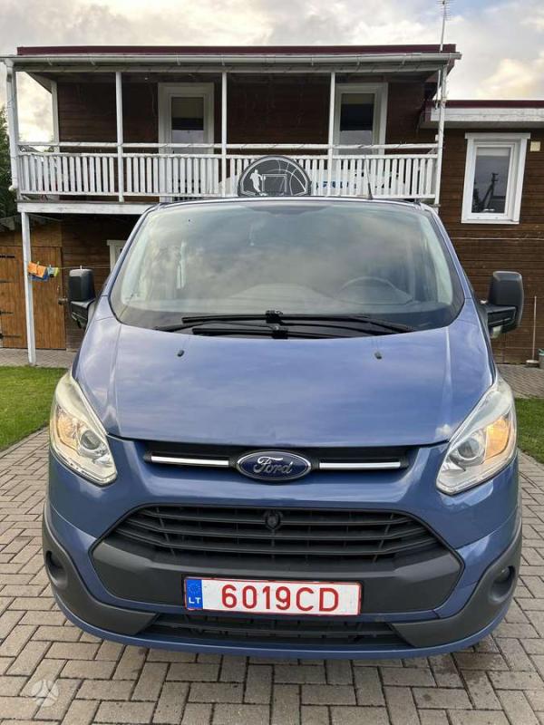 Blue Ford Transit Custom 2012 in Jonava, with an engine capacity of 2.20 L and mileage of 323 thousand km for 4950 €, photo 5 on AUTOMOTO.COM.LV