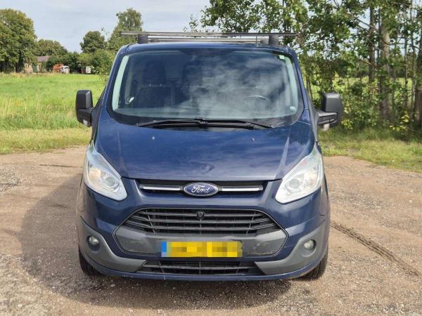 Blue Ford Transit Custom 2015 in Taurage, with an engine capacity of 2.20 L and mileage of 264 thousand km for 4300 €, photo 4 on AUTOMOTO.COM.LV