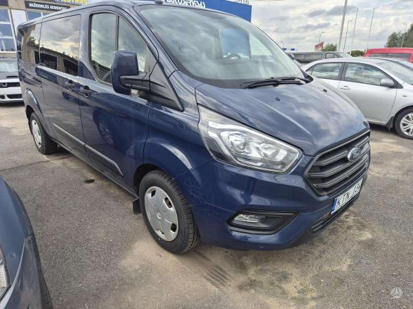Blue Ford Transit Custom 2018 in Mazeikiai, with an engine capacity of 2.00 L and mileage of 227 thousand km for 11999 €, photo 1 on AUTOMOTO.COM.LV