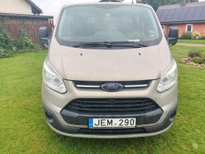 Brown Ford Transit Custom 2014 in Panevezys, with an engine capacity of 2.20 L and mileage of 402 thousand km for 10999 €, photo 4 on AUTOMOTO.COM.LV