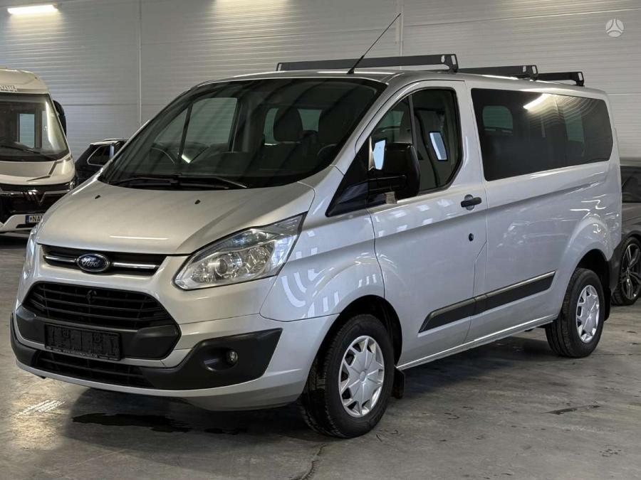 Grey Ford Transit Custom 2013 in Marijampole, with an engine capacity of 2.20 L and mileage of 186 thousand km for 11500 €, photo 4 on AUTOMOTO.COM.LV