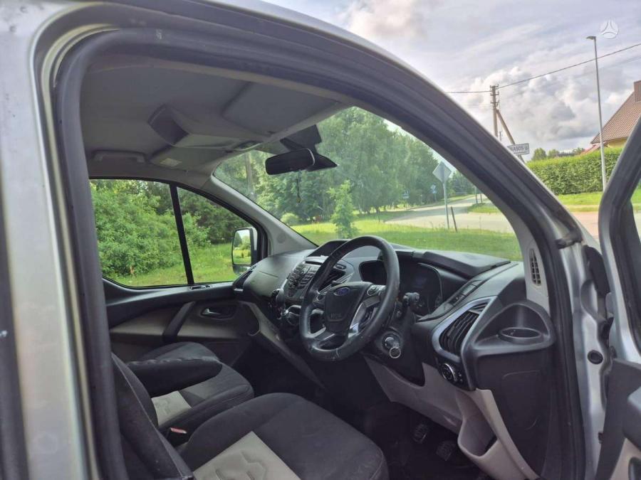 Grey Ford Transit Custom 2015 in Silute, with an engine capacity of 2.20 L and mileage of 245 thousand km for 3850 €, photo 9 on AUTOMOTO.COM.LV