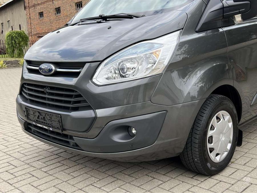 Grey Ford Transit Custom 2016 in Kedainiai, with an engine capacity of 2.20 L and mileage of 230 thousand km for 12800 €, photo 12 on AUTOMOTO.COM.LV