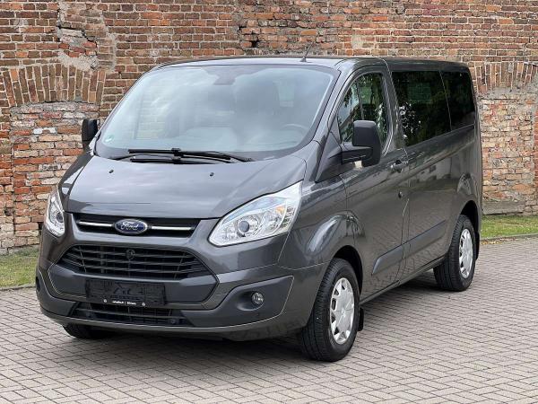 Grey Ford Transit Custom 2016 in Kedainiai, with an engine capacity of 2.20 L and mileage of 230 thousand km for 12800 €, photo 2 on AUTOMOTO.COM.LV