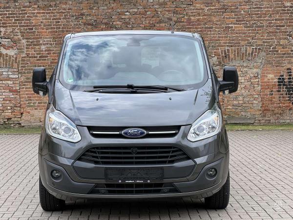 Grey Ford Transit Custom 2016 in Kedainiai, with an engine capacity of 2.20 L and mileage of 230 thousand km for 12800 €, photo 3 on AUTOMOTO.COM.LV