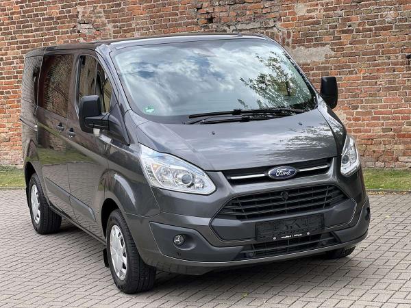 Grey Ford Transit Custom 2016 in Kedainiai, with an engine capacity of 2.20 L and mileage of 230 thousand km for 12800 €, photo 4 on AUTOMOTO.COM.LV