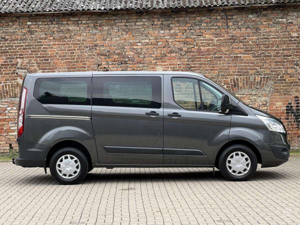 Grey Ford Transit Custom 2016 in Kedainiai, with an engine capacity of 2.20 L and mileage of 230 thousand km for 12800 €, photo 6 on AUTOMOTO.COM.LV