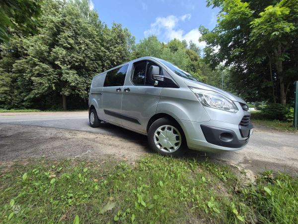 Grey Ford Transit Custom 2017 in Vilnius, with an engine capacity of 2.20 L and mileage of 346 thousand km for 8100 €, photo 2 on AUTOMOTO.COM.LV