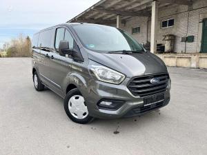 Grey Ford Transit Custom 2018 in Kelme, with an engine capacity of 2.00 L and mileage of 259 thousand km for 14800 €, photo 1 on AUTOMOTO.COM.LV