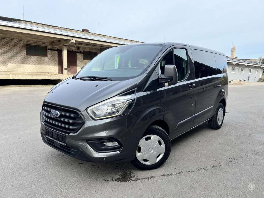 Grey Ford Transit Custom 2018 in Kelme, with an engine capacity of 2.00 L and mileage of 259 thousand km for 14800 €, photo 3 on AUTOMOTO.COM.LV