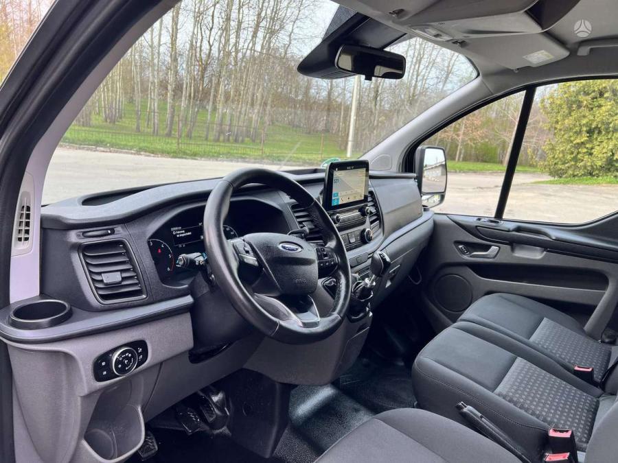 Grey Ford Transit Custom 2018 in Kelme, with an engine capacity of 2.00 L and mileage of 259 thousand km for 14800 €, photo 10 on AUTOMOTO.COM.LV