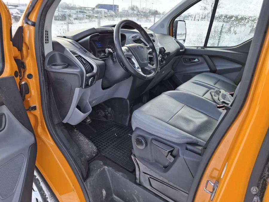 Orange Ford Transit Custom 2016 in Marijampole, with an engine capacity of 2.00 L and mileage of 221 thousand km for 11700 €, photo 6 on AUTOMOTO.COM.LV