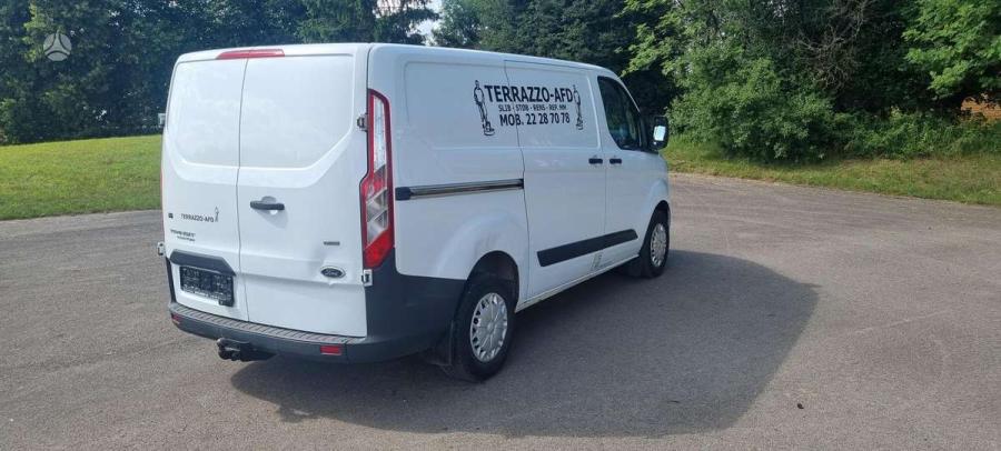 White Ford Transit Custom 2012 in Taurage, with an engine capacity of 2.20 L and mileage of 22 thousand km for 3700 €, photo 4 on AUTOMOTO.COM.LV