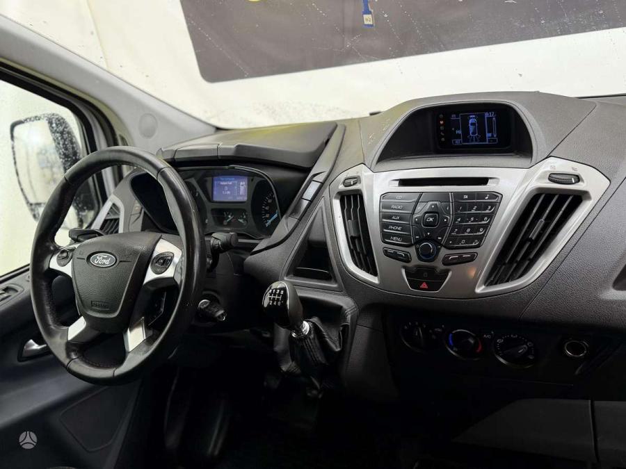 White Ford Transit Custom 2013 in Vilnius, with an engine capacity of 2.20 L and mileage of 355 thousand km for 4950 €, photo 17 on AUTOMOTO.COM.LV