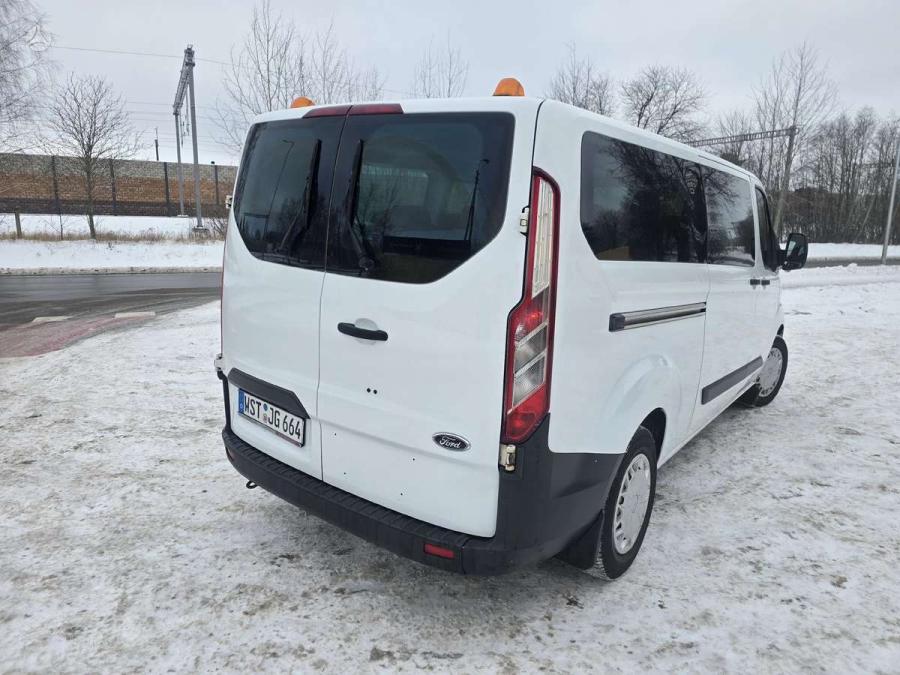 White Ford Transit Custom 2014 in Siauliai, with an engine capacity of 2.20 L and mileage of 279 thousand km for 9450 €, photo 8 on AUTOMOTO.COM.LV