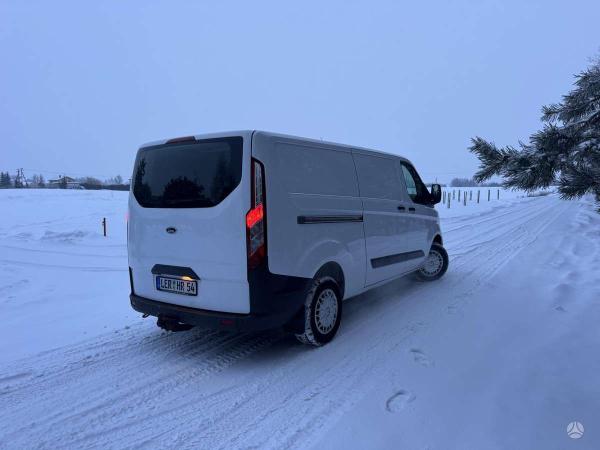 White Ford Transit Custom 2014 in Kaunas, with an engine capacity of 2.20 L and mileage of 264 thousand km for 5350 €, photo 2 on AUTOMOTO.COM.LV
