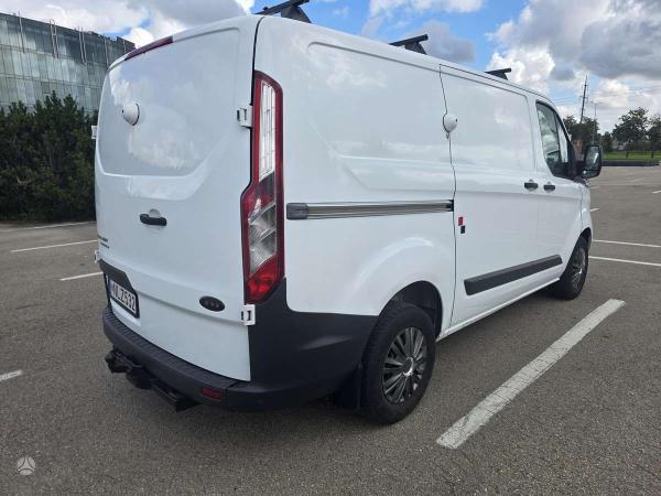 White Ford Transit Custom 2014 in Siauliai, with an engine capacity of 2.20 L and mileage of 210 thousand km for 4800 €, photo 3 on AUTOMOTO.COM.LV