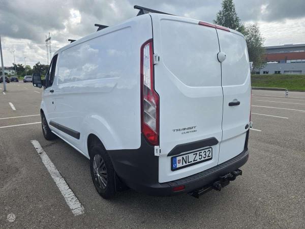White Ford Transit Custom 2014 in Siauliai, with an engine capacity of 2.20 L and mileage of 210 thousand km for 4800 €, photo 4 on AUTOMOTO.COM.LV