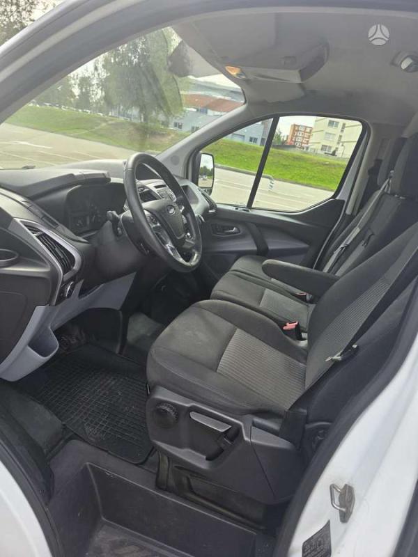 White Ford Transit Custom 2014 in Siauliai, with an engine capacity of 2.20 L and mileage of 210 thousand km for 4800 €, photo 5 on AUTOMOTO.COM.LV