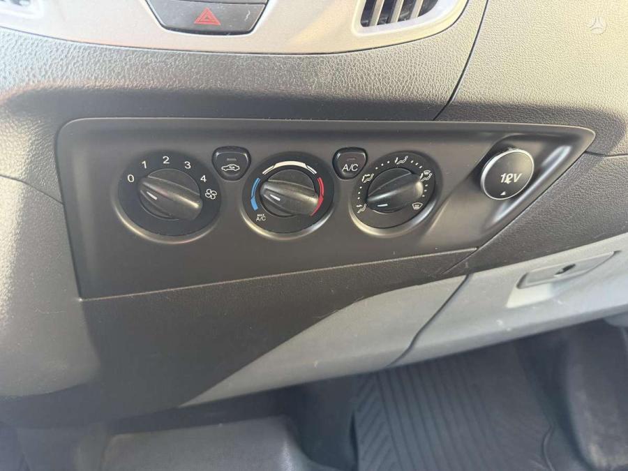 White Ford Transit Custom 2014 in Marijampole, with an engine capacity of 2.20 L and mileage of 190 thousand km for 5150 €, photo 12 on AUTOMOTO.COM.LV