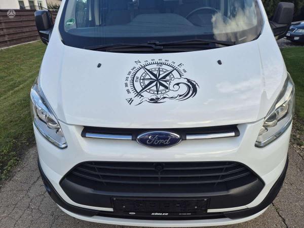 White Ford Transit Custom 2015 in Marijampole, with an engine capacity of 2.20 L and mileage of 239 thousand km for 8900 €, photo 8 on AUTOMOTO.COM.LV