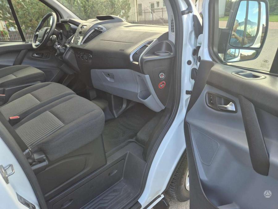 White Ford Transit Custom 2015 in Marijampole, with an engine capacity of 2.20 L and mileage of 239 thousand km for 8900 €, photo 14 on AUTOMOTO.COM.LV
