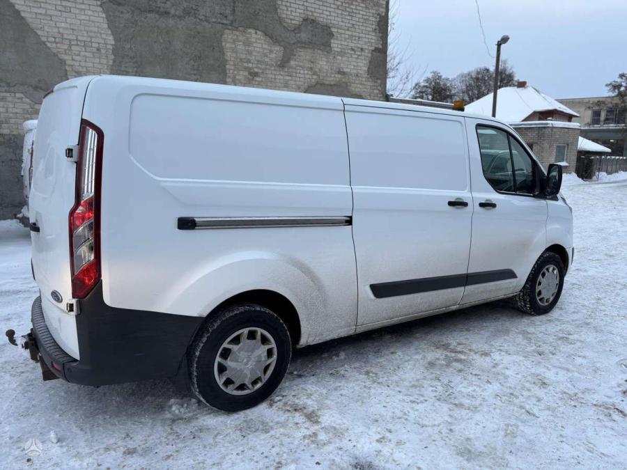 White Ford Transit Custom 2016 in Taurage, with an engine capacity of 2.00 L and mileage of 285 thousand km for 5800 €, photo 6 on AUTOMOTO.COM.LV