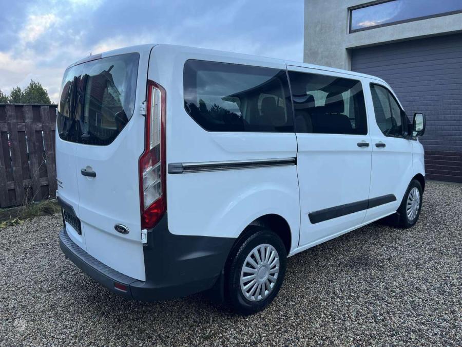 White Ford Transit Custom 2016 in Ukmerge, with an engine capacity of 2.20 L and mileage of 248 thousand km for 9950 €, photo 3 on AUTOMOTO.COM.LV