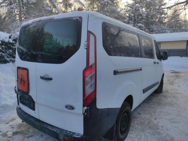 White Ford Transit Custom 2016 in Vilnius, with an engine capacity of 2.00 L and mileage of 233 thousand km for 10700 €, photo 3 on AUTOMOTO.COM.LV