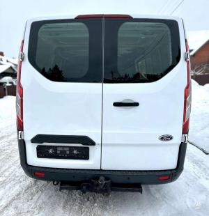 White Ford Transit Custom 2016 in Panevezys, with an engine capacity of 2.20 L and mileage of 126 thousand km for 7750 €, photo 6 on AUTOMOTO.COM.LV