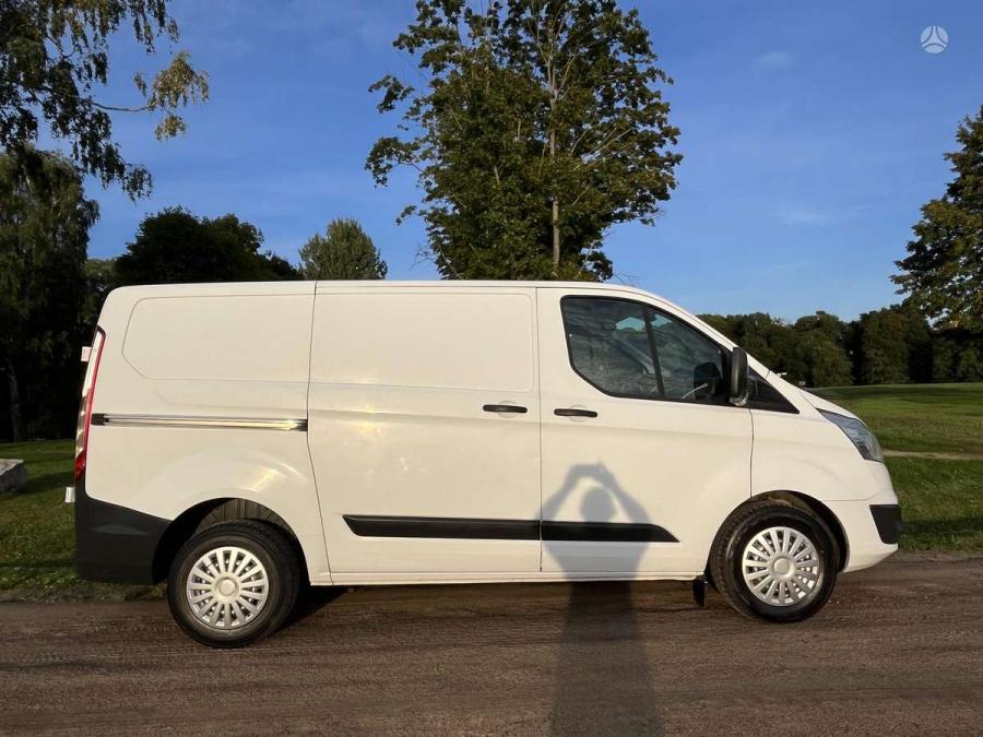White Ford Transit Custom 2016 in Silale, with an engine capacity of 2.20 L and mileage of 250 thousand km for 5290 €, photo 5 on AUTOMOTO.COM.LV
