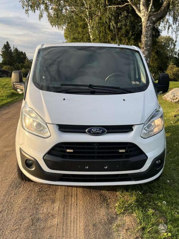 White Ford Transit Custom 2016 in Silale, with an engine capacity of 2.20 L and mileage of 250 thousand km for 5290 €, photo 8 on AUTOMOTO.COM.LV