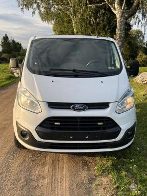 White Ford Transit Custom 2016 in Silale, with an engine capacity of 2.20 L and mileage of 250 thousand km for 5290 €, photo 8 on AUTOMOTO.COM.LV