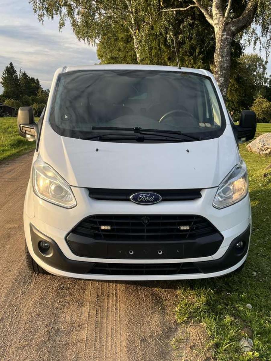 White Ford Transit Custom 2016 in Silale, with an engine capacity of 2.20 L and mileage of 250 thousand km for 5290 €, photo 8 on AUTOMOTO.COM.LV