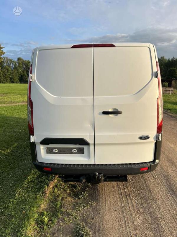 White Ford Transit Custom 2016 in Silale, with an engine capacity of 2.20 L and mileage of 250 thousand km for 5290 €, photo 9 on AUTOMOTO.COM.LV