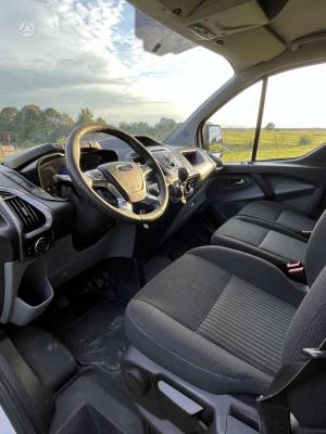 White Ford Transit Custom 2016 in Silale, with an engine capacity of 2.20 L and mileage of 250 thousand km for 5290 €, photo 13 on AUTOMOTO.COM.LV