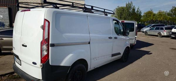Ford Transit Custom 2016 in Kaunas on AUTOMOTO.COM.LV White Ford Transit Custom 2016 in Kaunas, with an engine capacity of 2.00 L and mileage of 239 thousand km for 5700 €, photo 7 on AUTOMOTO.COM.LV